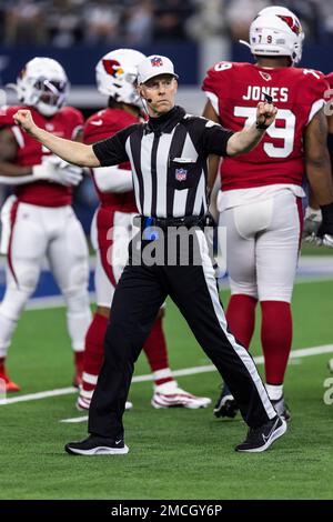 Referee Scott Novak (1) signals during an NFL football game between the ...