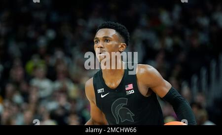 Michigan State guard Tyson Walker (2) walks off the court after the ...
