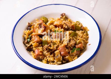 Original spanish paella recipe with rabbit, pork and vegetables Stock ...