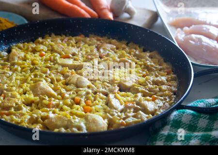Chicken curry paella with vegetables. Authentic Paella spanish recipe ...