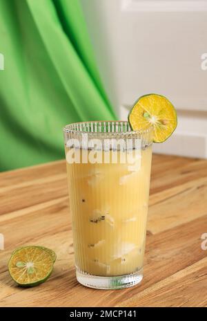 Es Kelapa Jeruk or Fresh Coconut Orange, Indonesian Typical Drink made ...