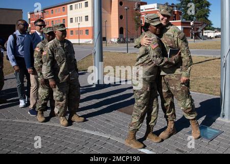 Sgt. 1st Class Taylor Strack stands at attention alongside Maj. Gen ...