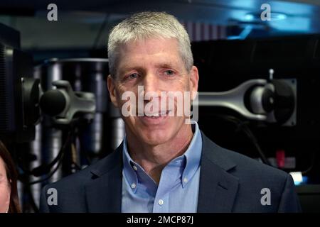 Garmin President & CEO Cliff Pemble, right, rings the New York Stock ...