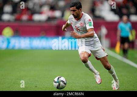 Tunisia's Mohamed Ben Hmida is in action during the group B Arab Cup ...