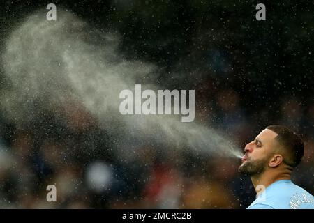 Manchester City's Kyle Walker spitting water ahead of second half of ...