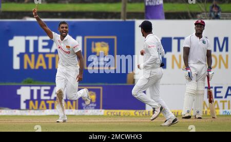 Sri Lankan bowler Lasith Embuldeniya, left, celebrates the wicket of ...