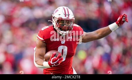 Wisconsin running back Braelon Allen (0) runs during the first half of ...