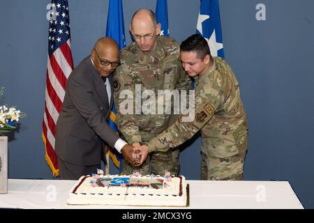 Gen. Duke Z. Richardson, commander, Air Force Materiel Command, coins ...