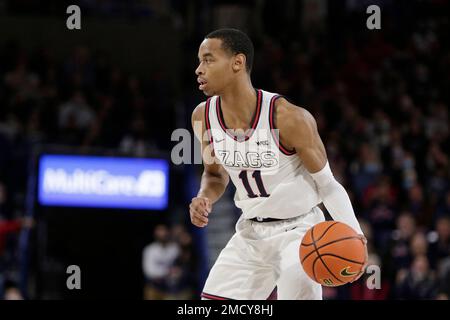 Gonzaga guard Nolan Hickman controls the ball during the first half of ...