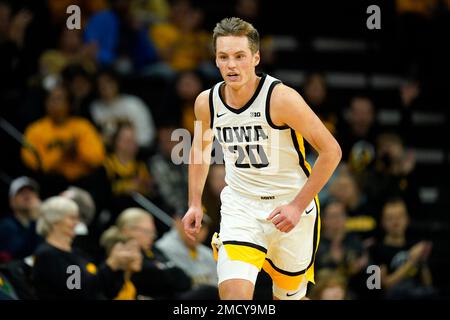 Iowa guard Payton Sandfort runs up court during the first half of an ...