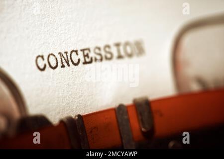 Concession word written with a typewriter Stock Photo - Alamy