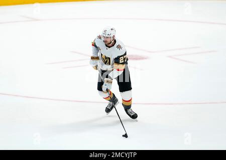 Vegas Golden Knights defenseman Shea Theodore handles the puck during ...