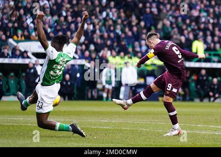 Heart of Midlothian's Lawrence Shankland (second right) misses a penalty, but scores on the ...
