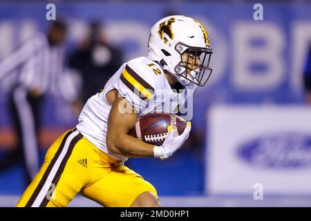 Wyoming Cowboys cornerback Cameron Stone (4) looks up for the football ...