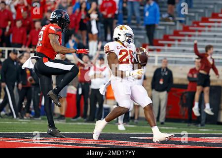 Texas Tech's Reggie Pearson Jr. (22) grabs a beer can that was thrown ...