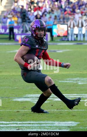 TCU quarterback Chandler Morris scrambles out of the pocket during an ...
