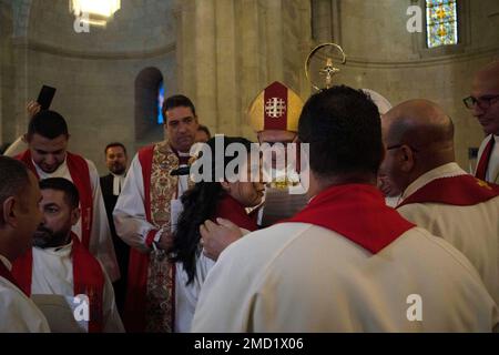 Sally Ibrahim Azar, center, a Palestinian Christian and Council member ...