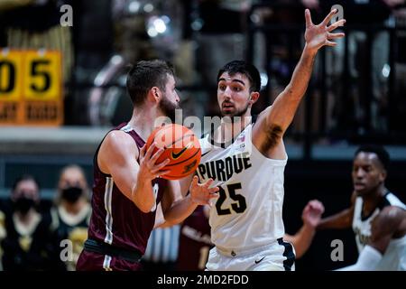 Purdue guard Ethan Morton (25) tries to get past Iowa guard Connor ...