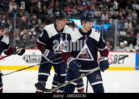 Colorado Avalanche center Jayson Megna, right pursues the puck while ...
