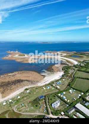 A vertical aerial shot of the port with parked ships and a crystal ...