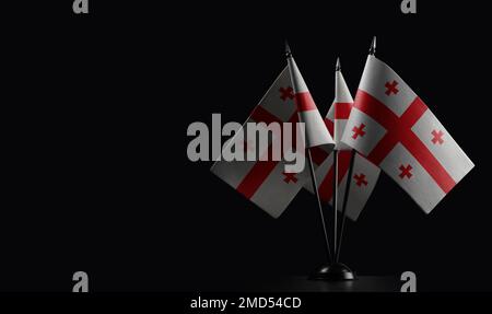 Small national flags of the Georgia on a black background Stock Photo ...