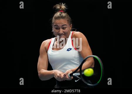 Iryna Shymanovich of Belarus returns a ball to Belgium's Elise Mertens ...