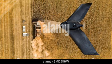 Autonomous combine harvester and drone Stock Photo - Alamy