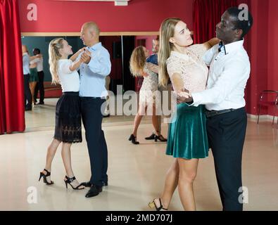 People dancing slow ballroom dances in pairs Stock Photo - Alamy