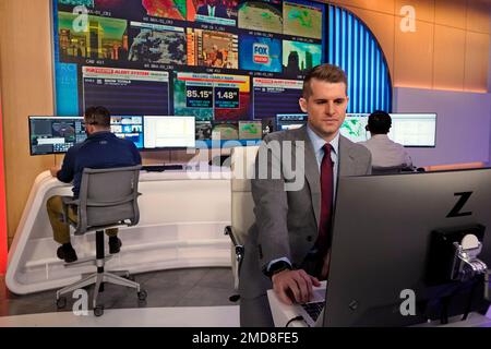 Fox Weather meteorologist Stephen Morgan rehearses on the Fox Weather ...