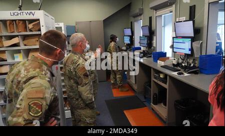 Air Force Col. Christopher Meeker, 88th Air Base Wing and installation commander, gets a behind ...