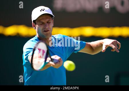 Hubert Hurkacz, of Poland, returns to Grigor Dimitrov, of Bulgaria, at ...