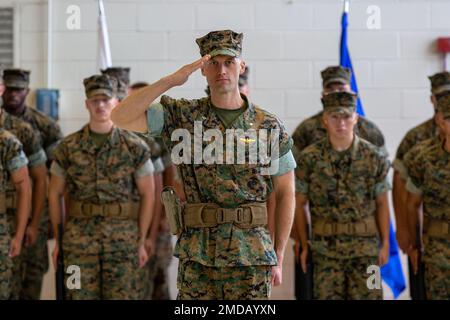 U.S. Marine Corps Col. Marlin D. Williams, center, presents the Legion ...