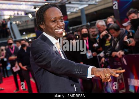 Michael Ajao poses for photographers upon arrival at the premiere of ...