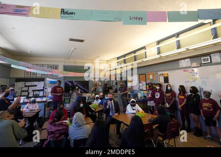 Gov. Gavin Newsom, middle, speaks to students in a seventh grade ...