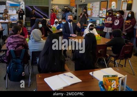 Gov. Gavin Newsom, middle, speaks to students in a seventh grade ...