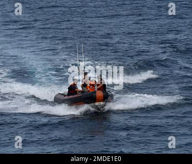 The USCGC Mohawk (WMEC 913) conducts a MK-75 gun exercise while ...