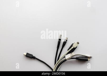 Mixed types of charging cables isolated on white background Stock Photo ...