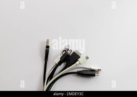 Mixed types of charging cables isolated on white background Stock Photo ...
