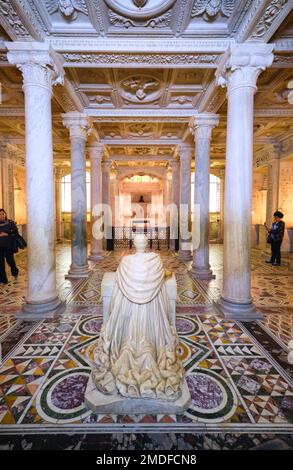 The underground, basement marble crypt, with a kneeling statue of Saint ...