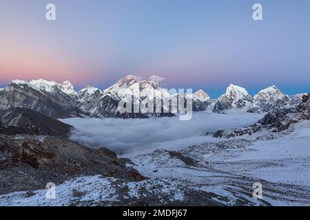 Breathtaking sunset over Mount Everest summit colored in an ...