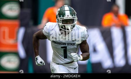 Michigan State wide receiver Jayden Reed (1) runs against Rutgers ...