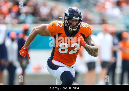 Denver Broncos tight end Eric Saubert (82) runs the field on a kickoff during an NFL football ...