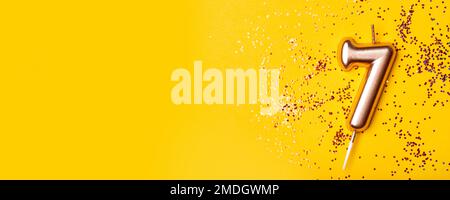 Gold candle in the form of number one Stock Photo - Alamy