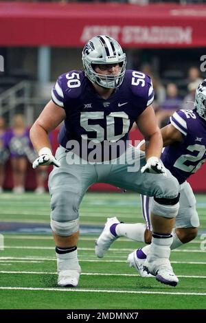 Kansas State offensive lineman Cooper Beebe (50) defends during an NCAA ...