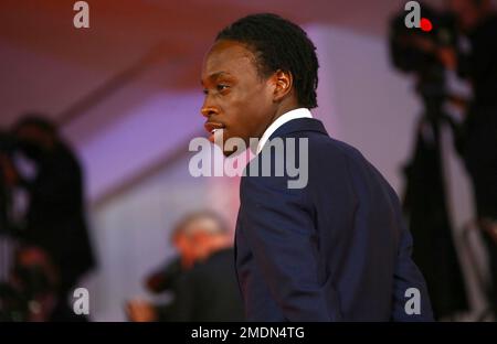 Michael Ajao poses for photographers upon arrival at the premiere of ...