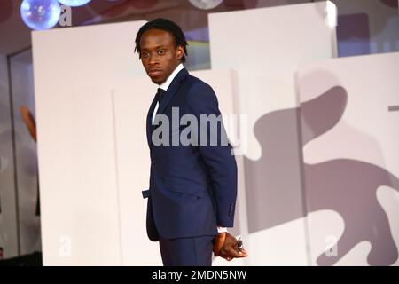 Michael Ajao poses for photographers upon arrival at the premiere of ...