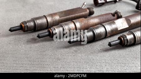 Mechanical injectors from a diesel engine, close-up. Fuel atomization ...