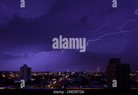 The bright blizzards in the night sky above the city Stock Photo - Alamy
