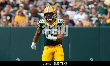Green Bay Packers' Isaiah McDuffie rides a bike to the NFL football ...