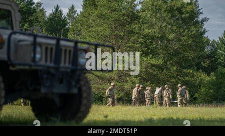 A Soldier assigned to the 483rd Area Clearance Platoon, build a ...